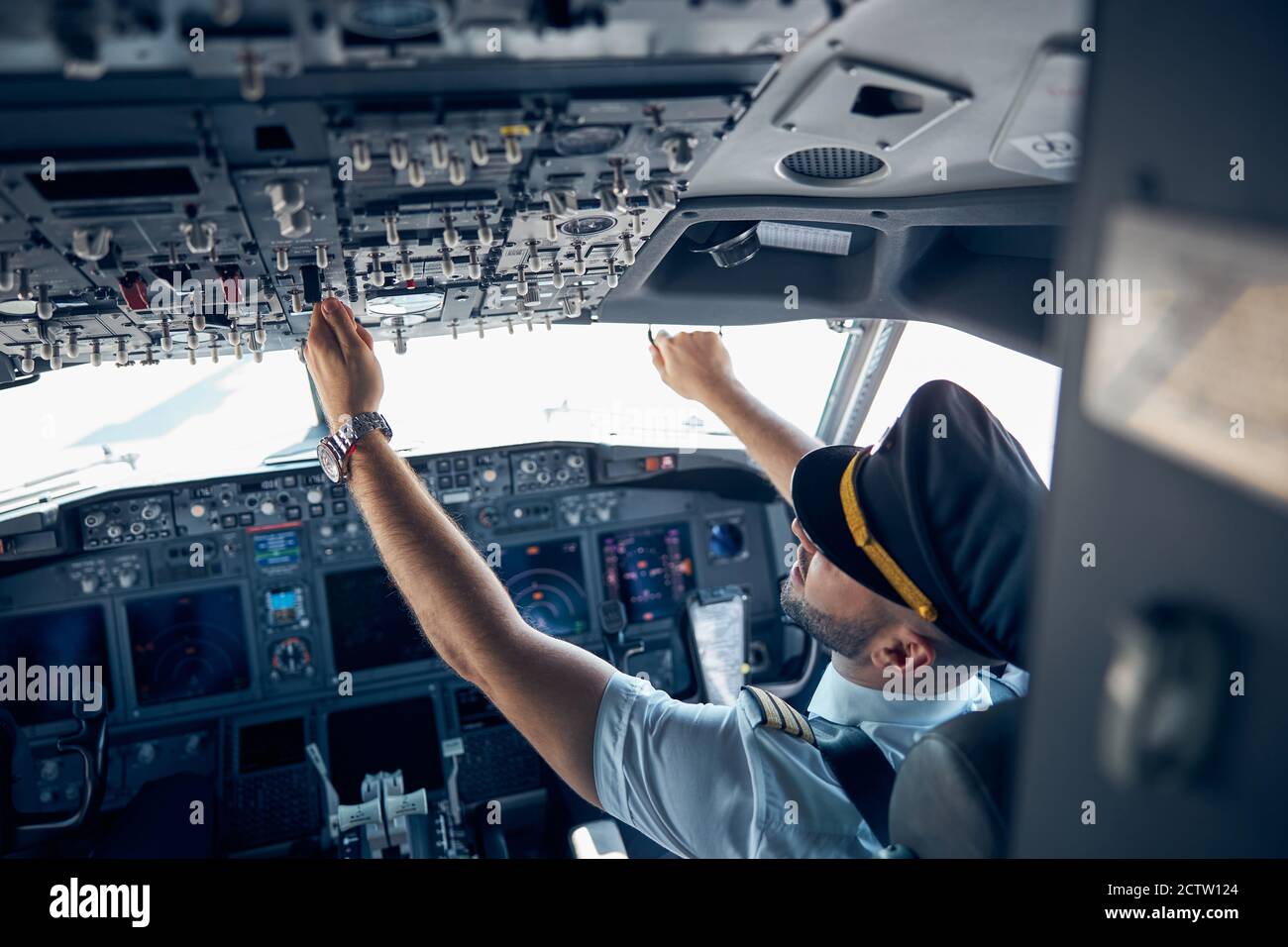 Airplane with pilot on board preparing to leaving airport Stock Photo ...
