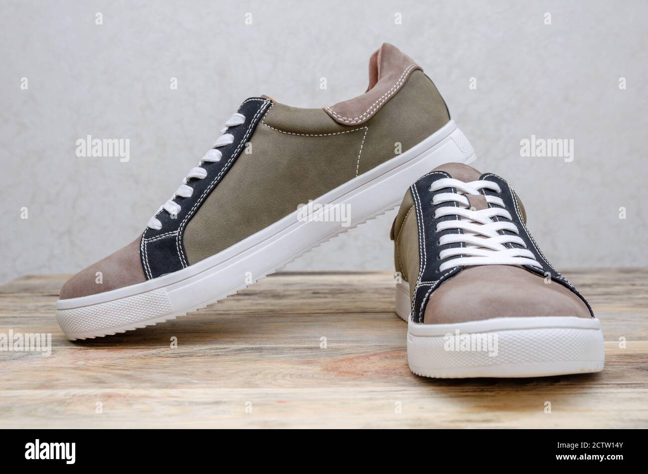 Black sneakers with white soles hi-res stock photography and images - Alamy