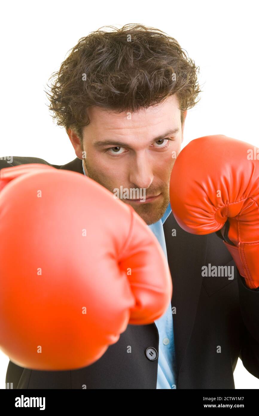Young man in suit with red boxing gloves Stock Photo - Alamy