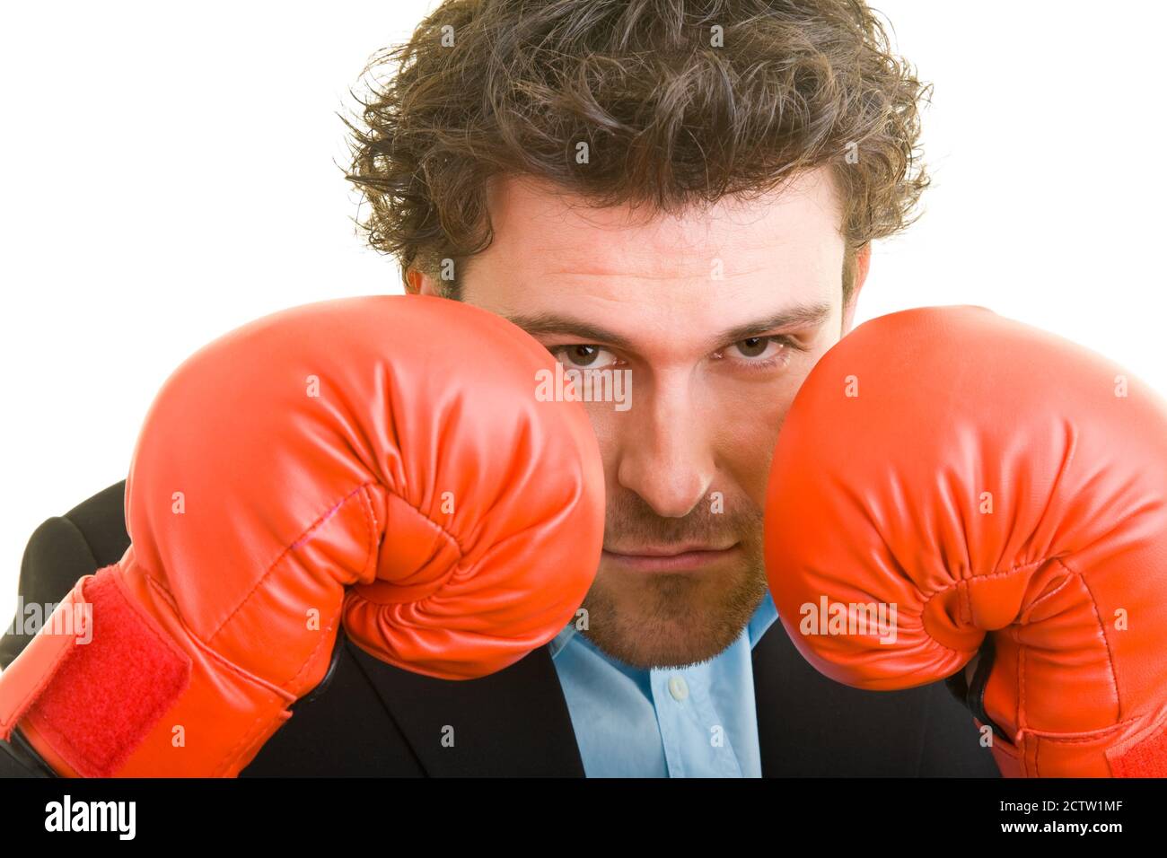 Young man in suit with red boxing gloves Stock Photo - Alamy