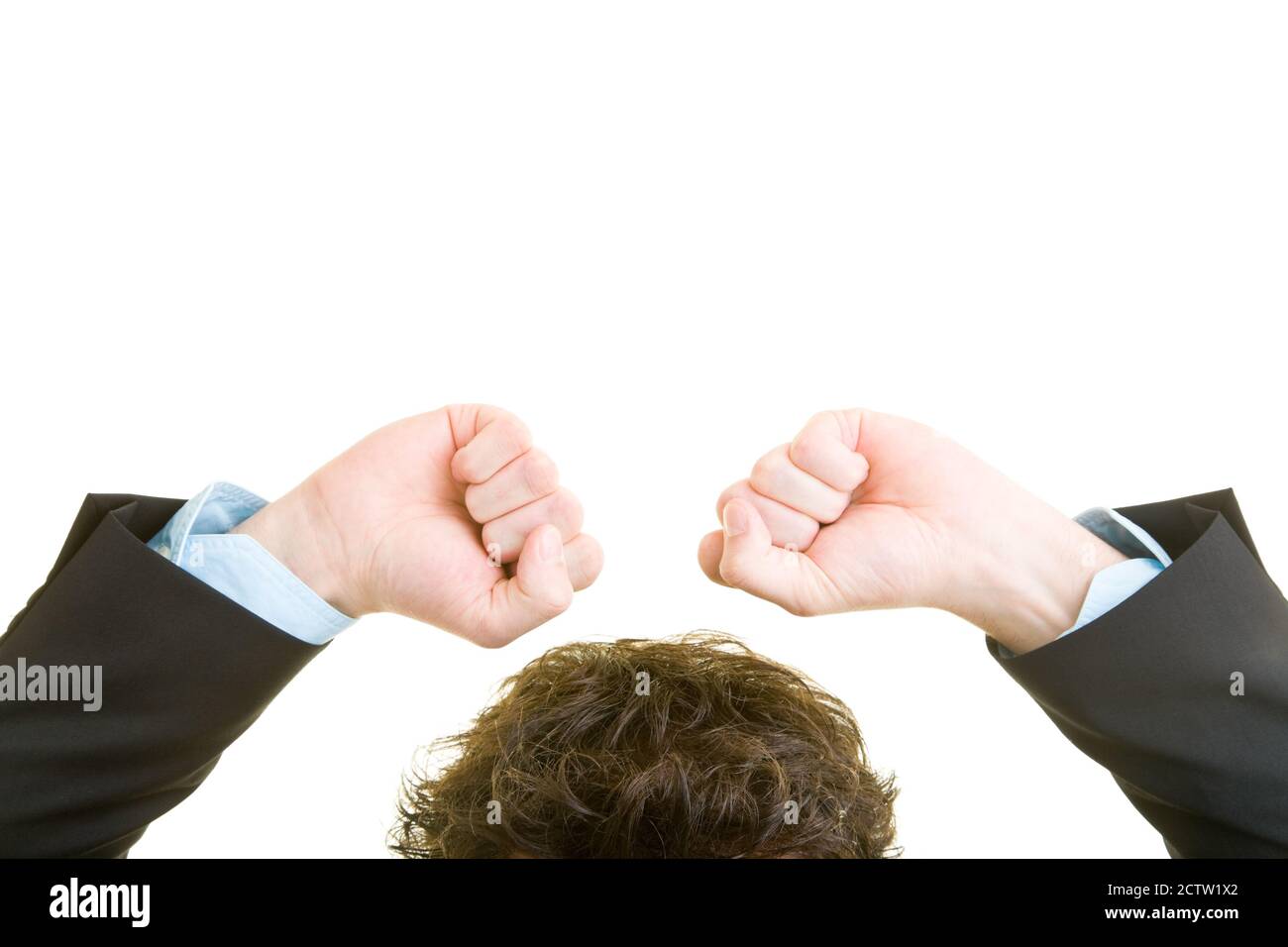 Hands clenched into fists above head Stock Photo - Alamy