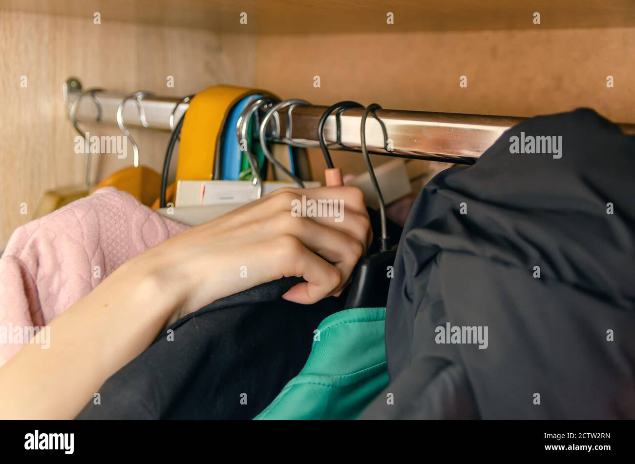 Belts hanging closet hi-res stock photography and images - Alamy