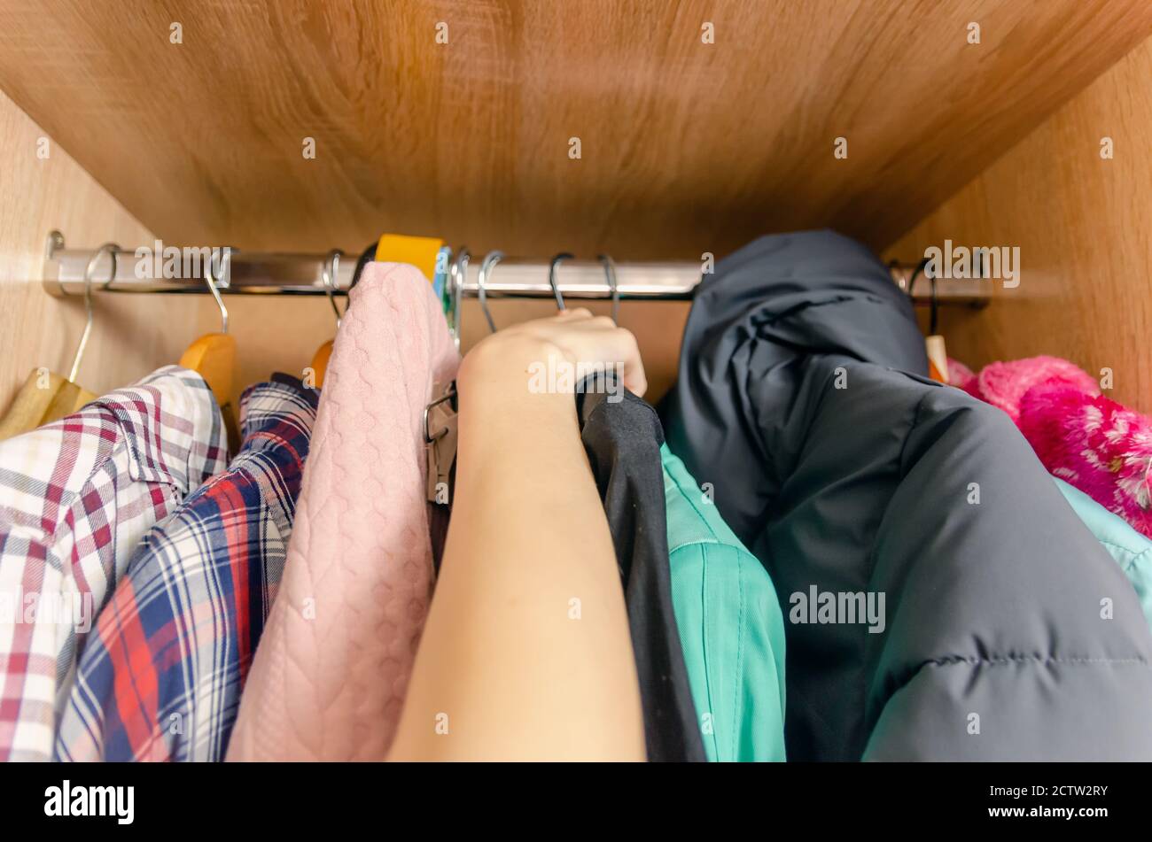 Belts hanging closet hi-res stock photography and images - Alamy