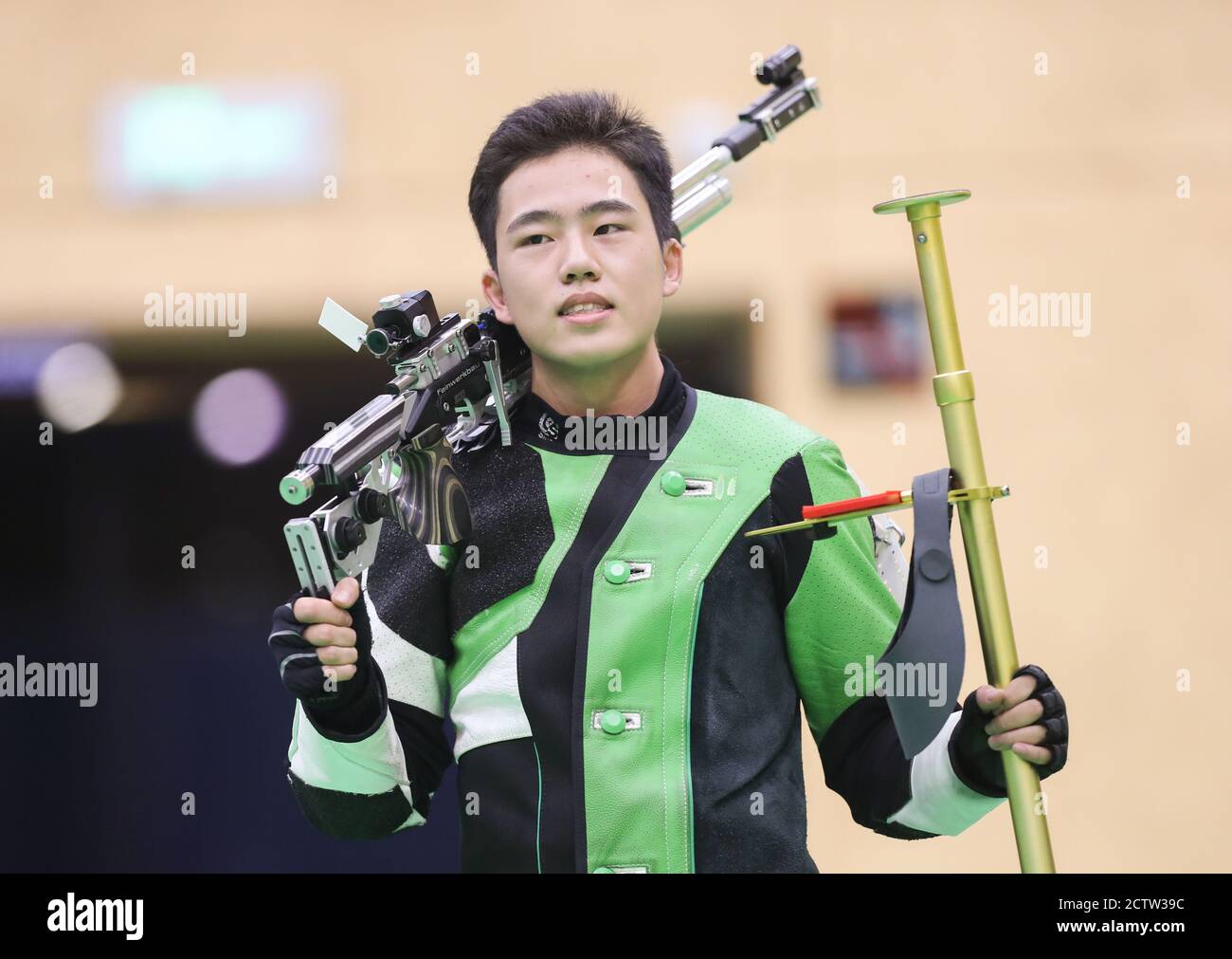 (200925) -- YICHANG, Sept. 25, 2020 (Xinhua) -- Liu Baichen reacts after the men's 10m air rifle ...