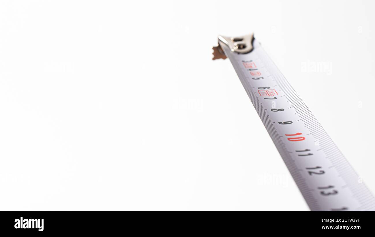 A centimetre roulette tape on a white background with a place for ...