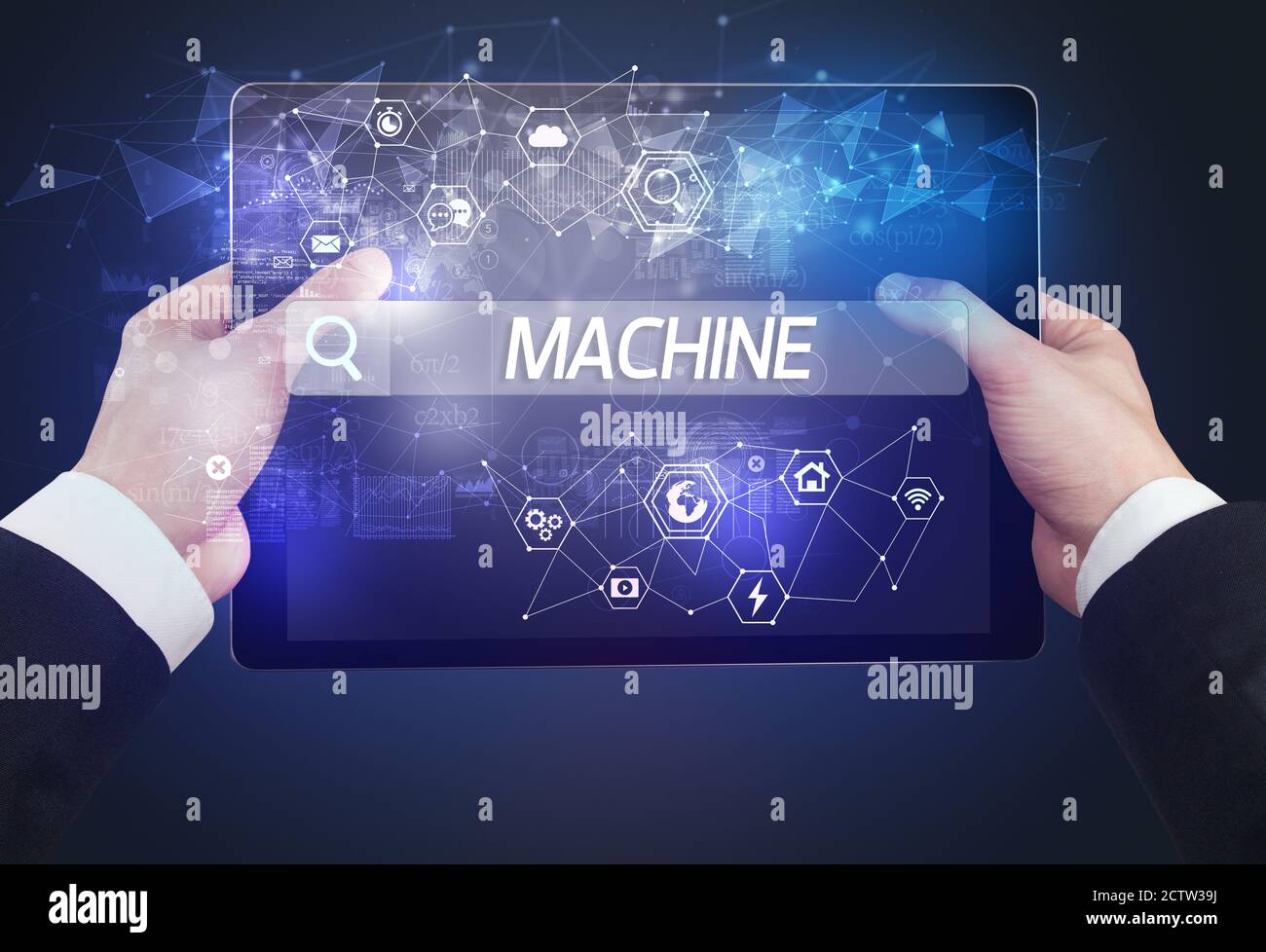 Close-up of a tablet searching MACHINE inscription, hi-tech computing ...