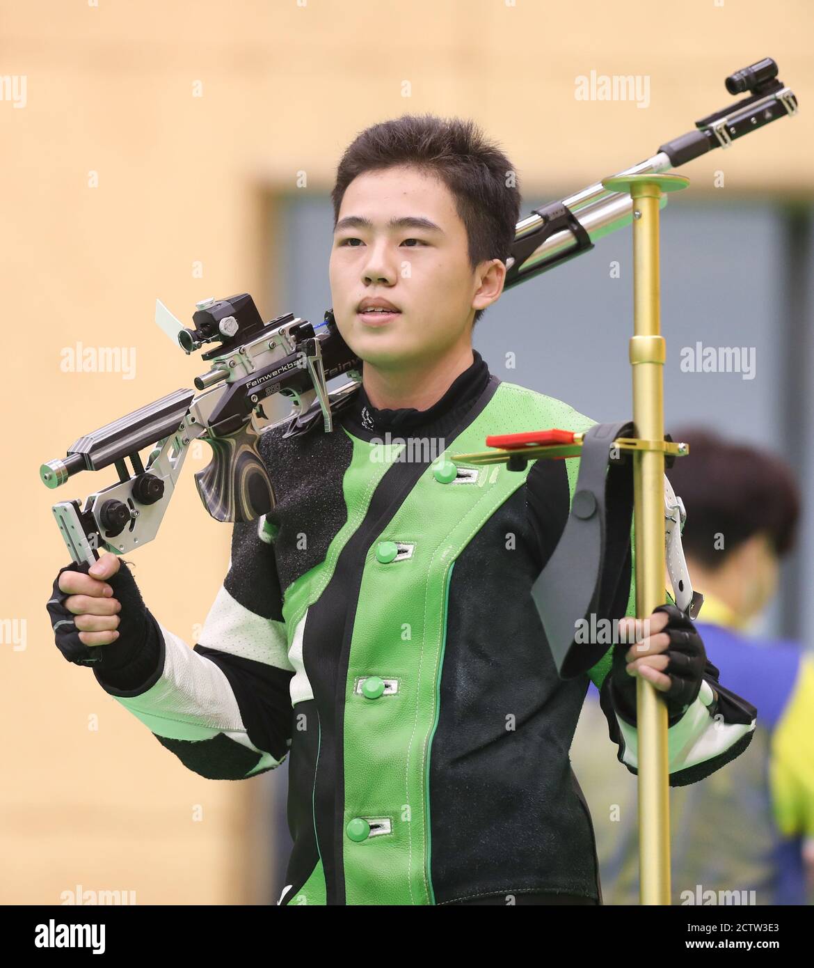 (200925) -- YICHANG, Sept. 25, 2020 (Xinhua) -- Liu Baichen reacts after the men's 10m air rifle ...