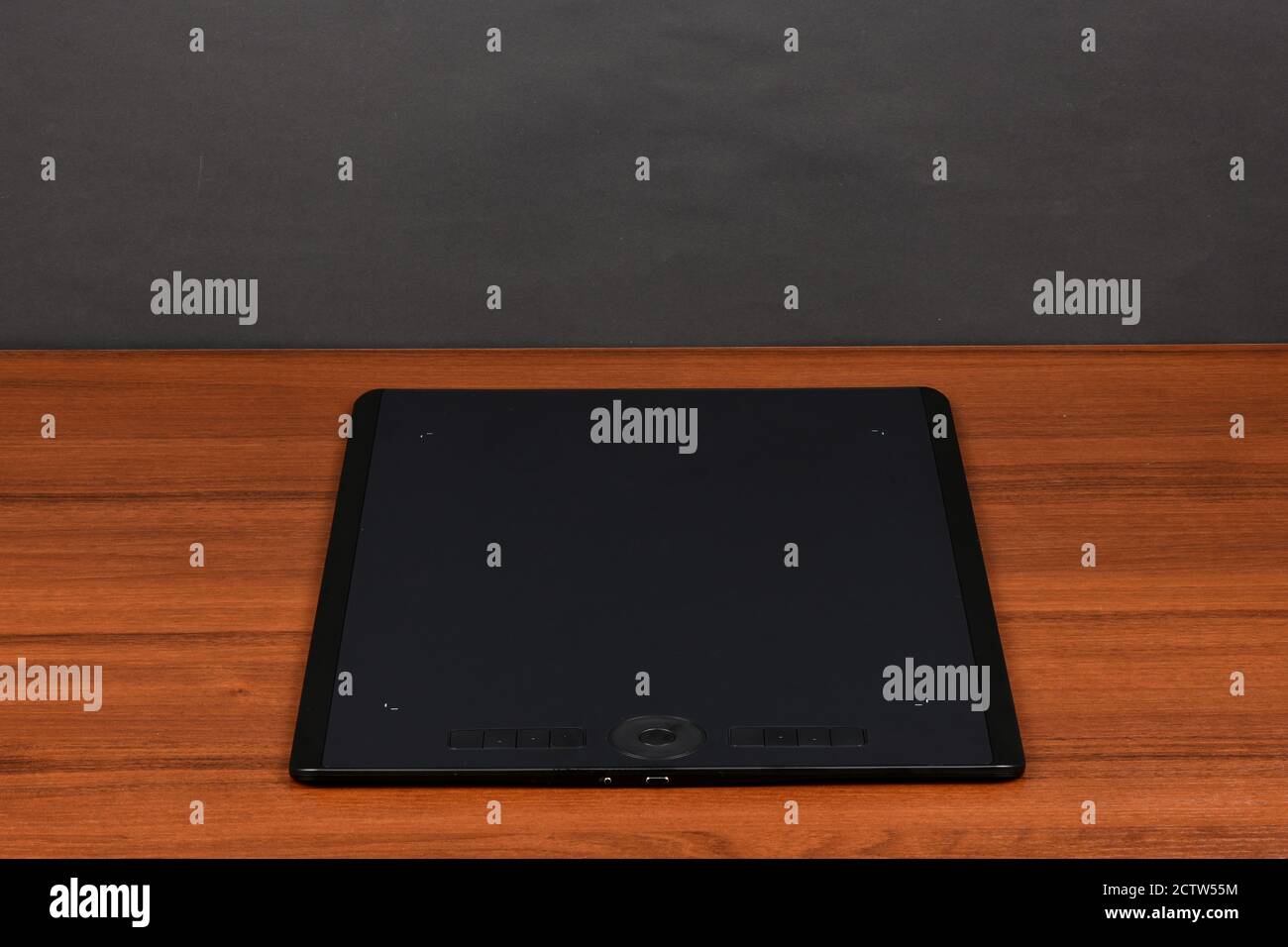 Professional graphics tablet on wooden table. High resolution photo ...