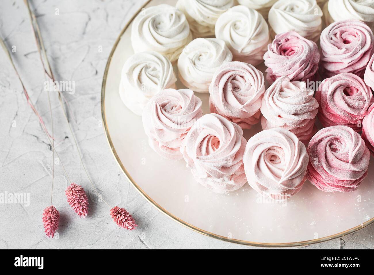 Sweet dessert zephyr marshmallows close up. Big zephyr sprinkled with ...