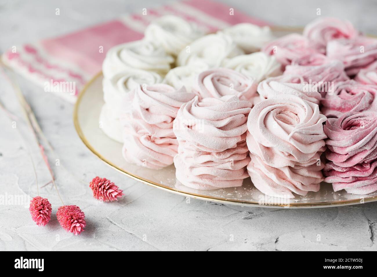 Sweet dessert zephyr marshmallows close up. Big zephyr sprinkled with ...