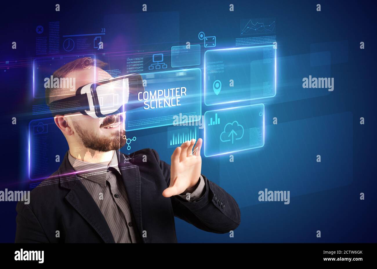 Businessman looking through Virtual Reality glasses with COMPUTER ...