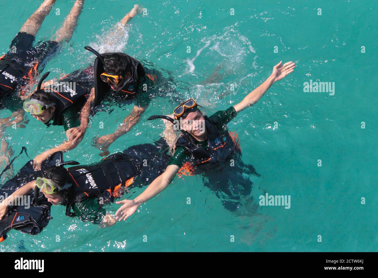 Woman float sea hi-res stock photography and images - Alamy