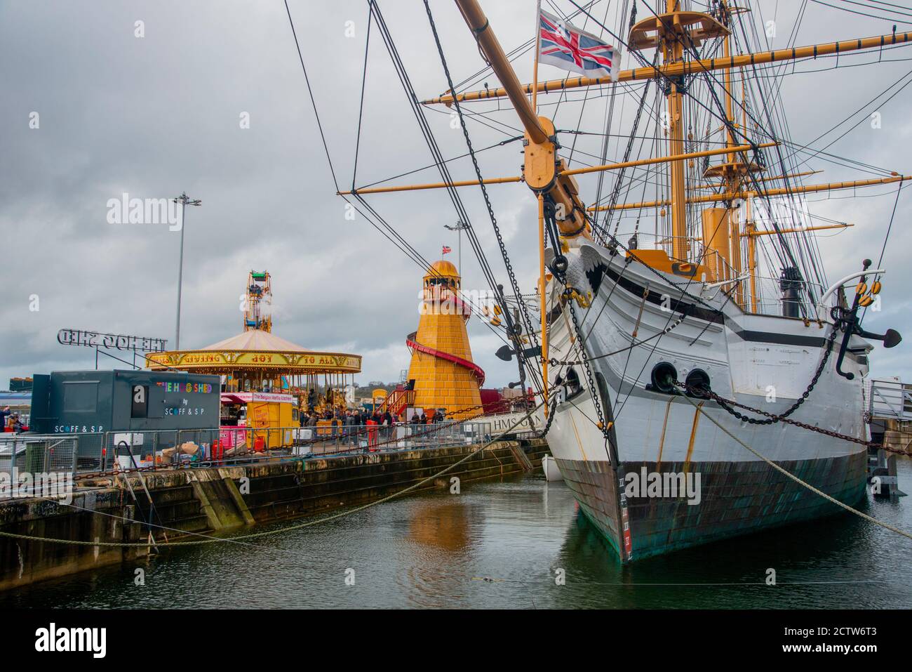 HMS Garnet in front of crowds and a traditional fun fair at Chatham ...