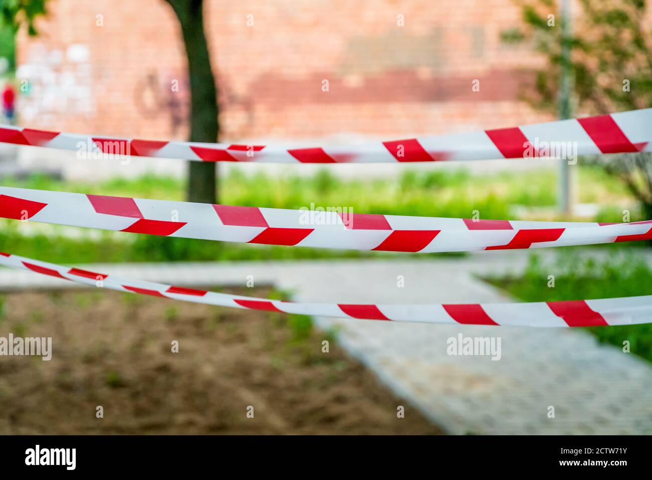 Red and white lines of the barrier tape. Red and white warning tape ...
