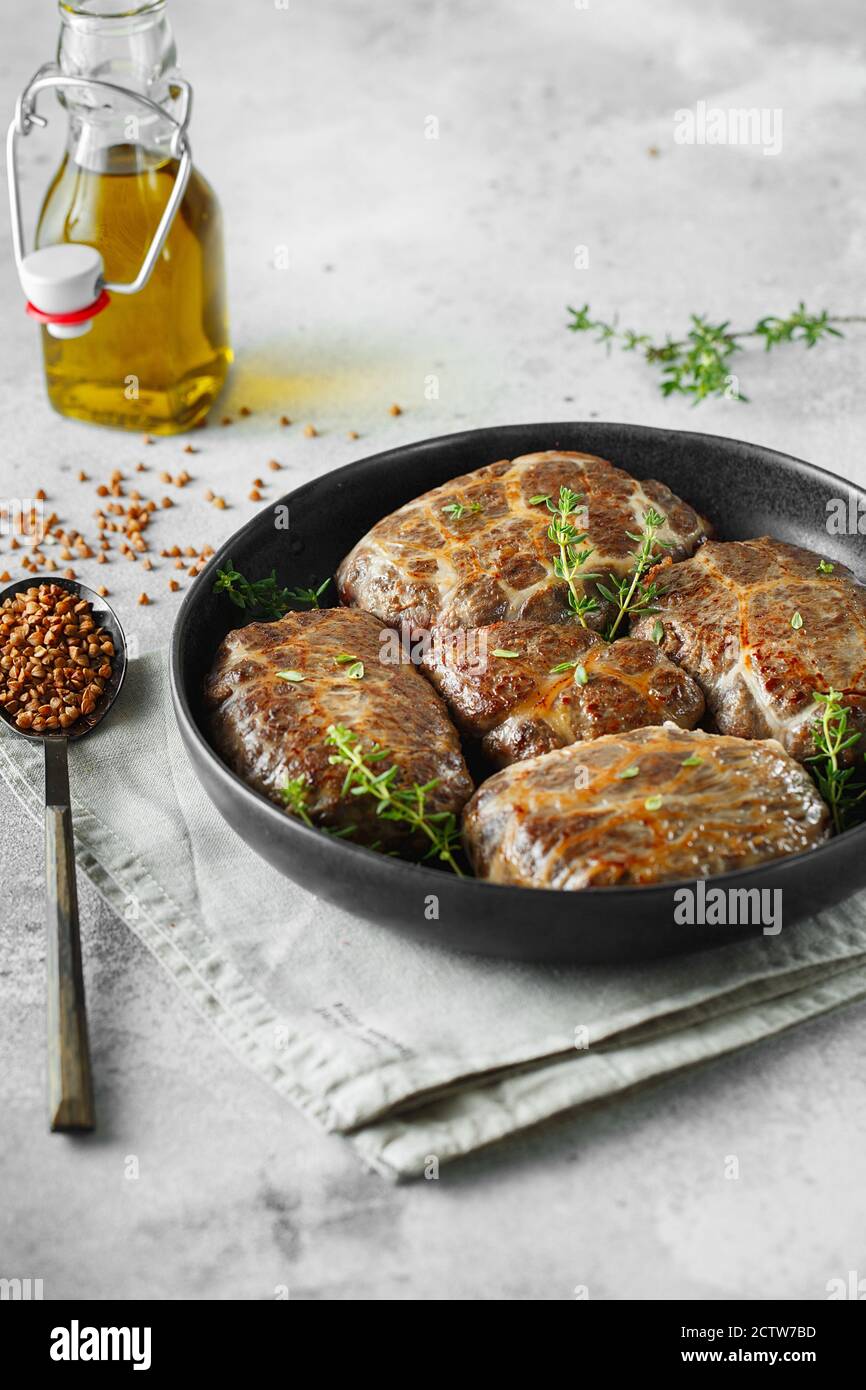 Delicious grilled liver meatballs with buckwheat in a natural casing ...