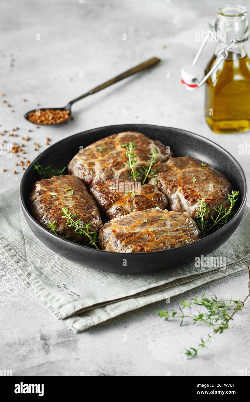 Delicious grilled liver meatballs with buckwheat in a natural casing ...