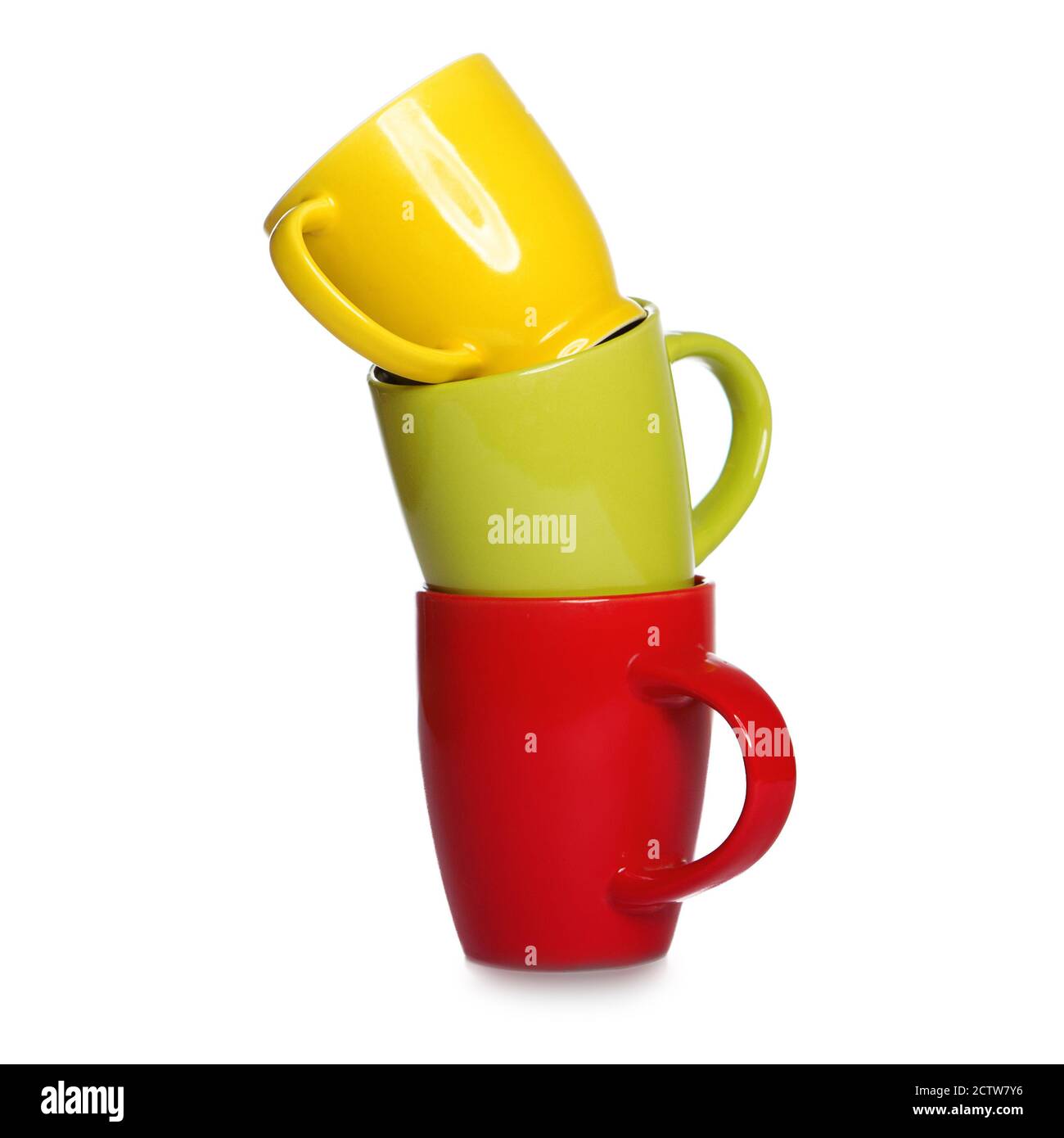 Stack of three motley cups isolated on white background. Three coffee ...