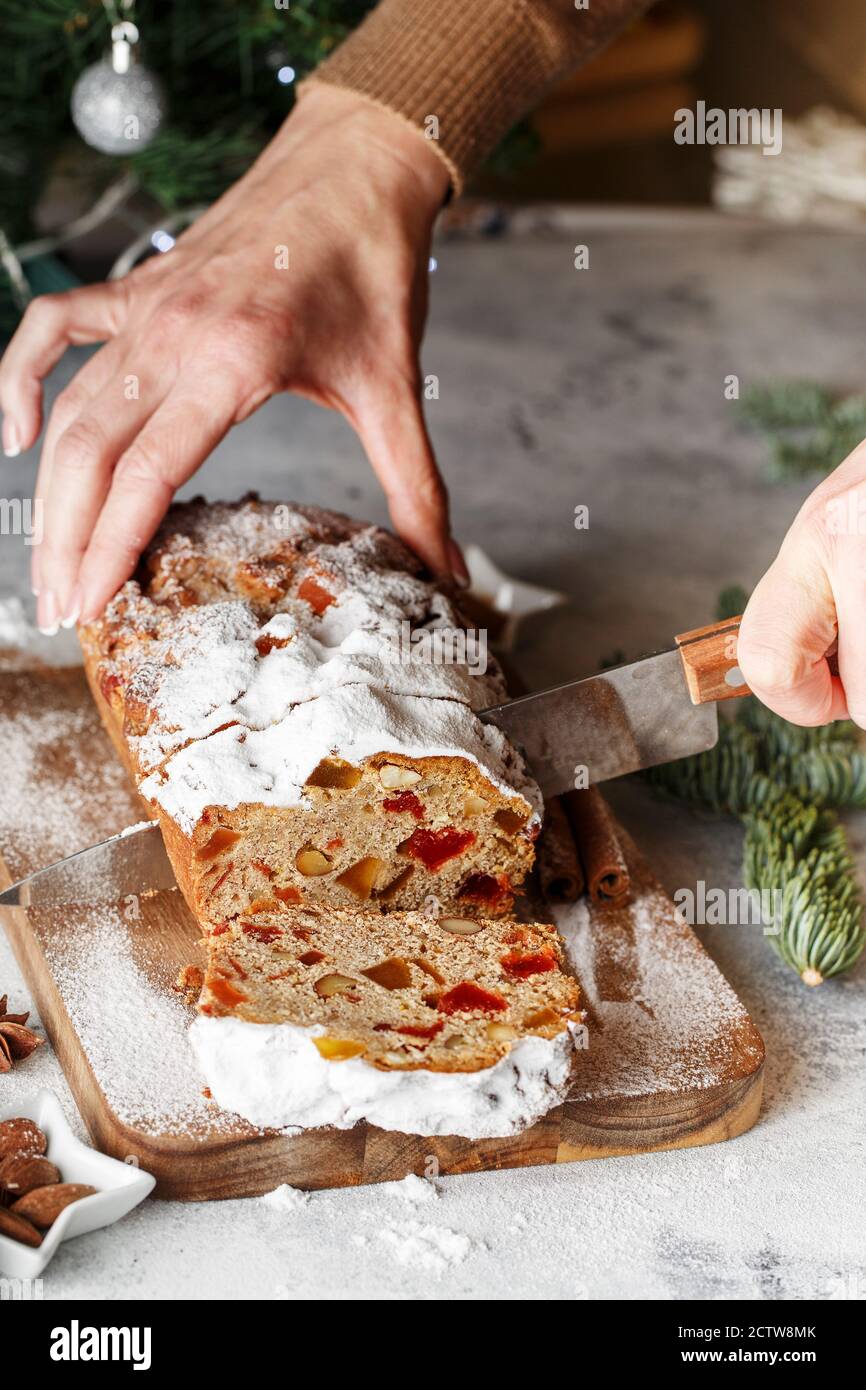 Stollen is fruit bread of nuts, spices, dried or candied fruit, coated ...