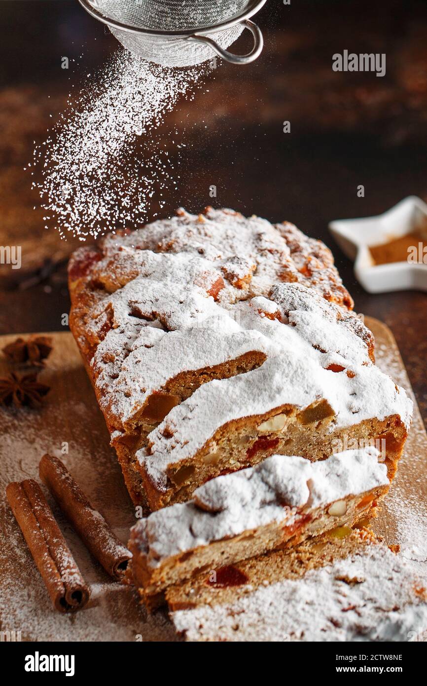Stollen is fruit bread of nuts, spices, dried or candied fruit, coated ...
