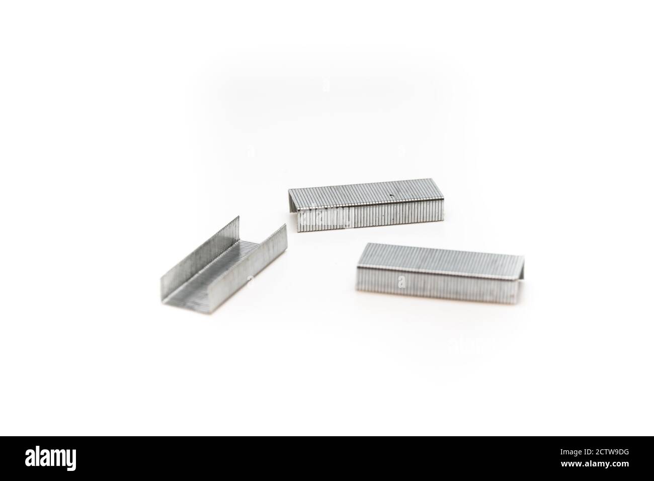 staples stack isolated on a white background Stock Photo - Alamy