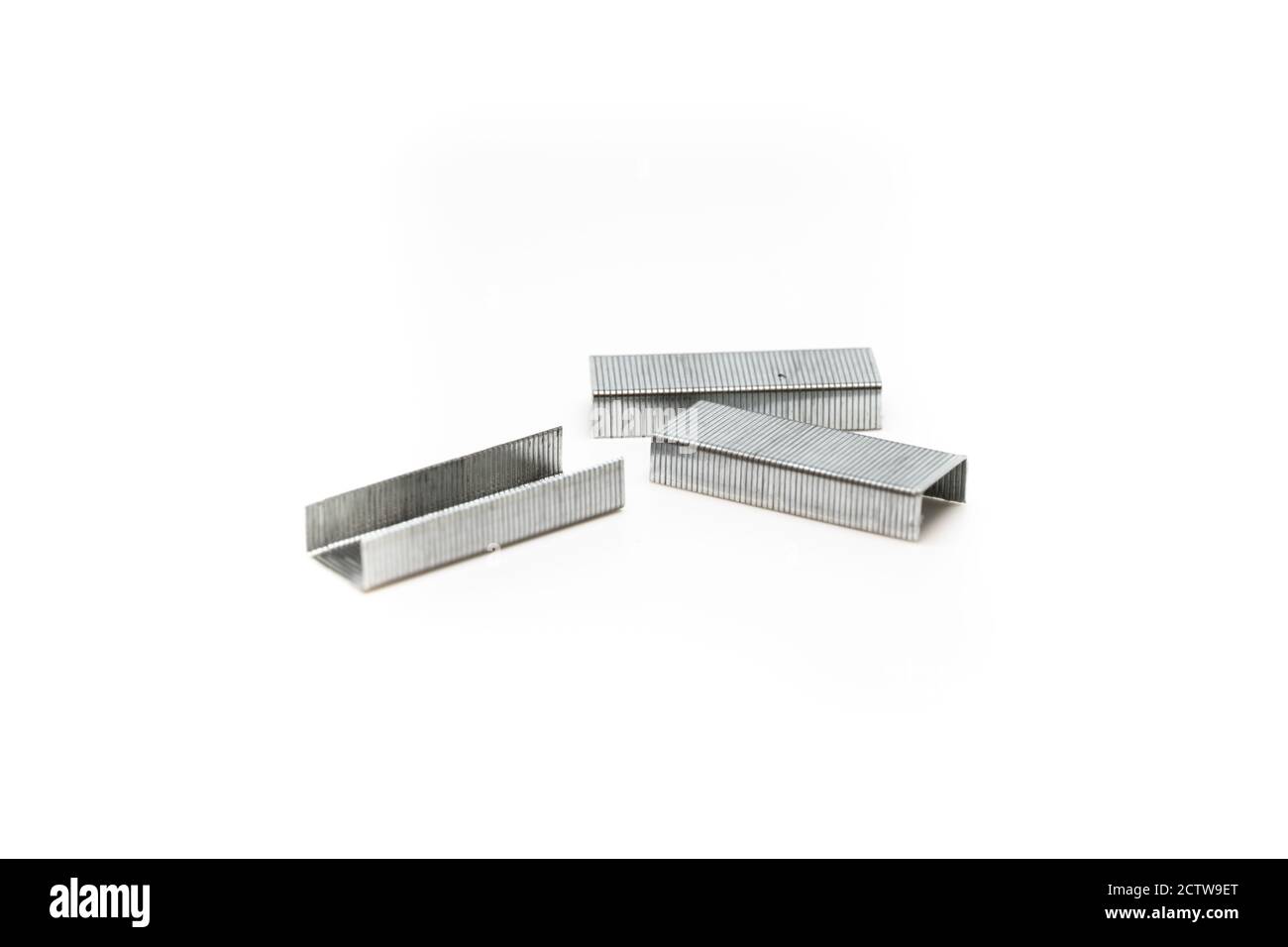 staples stack isolated on a white background Stock Photo - Alamy