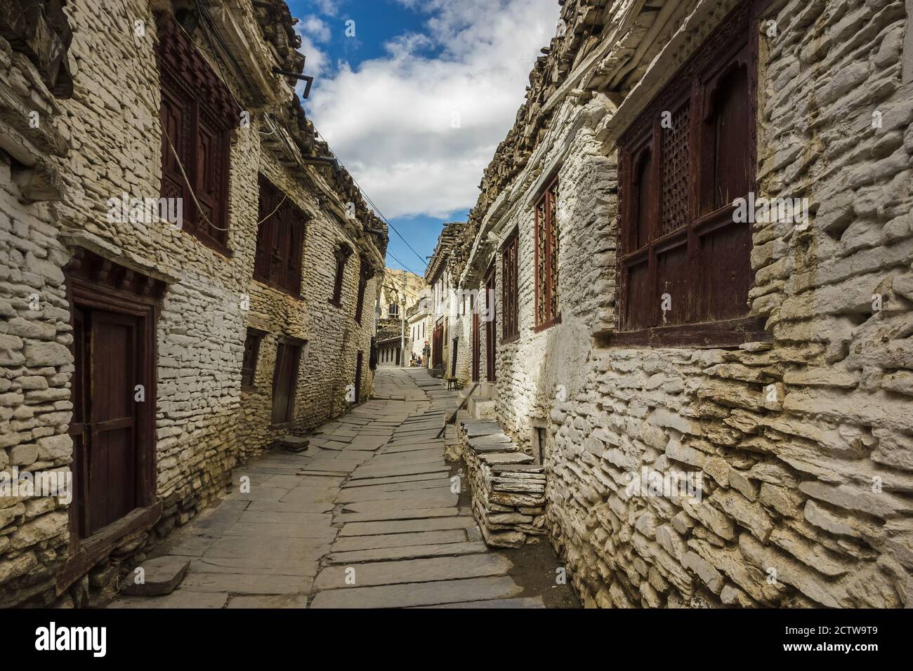 Beautiful shot of Marpha village's narrow street in Nepal Stock Photo ...