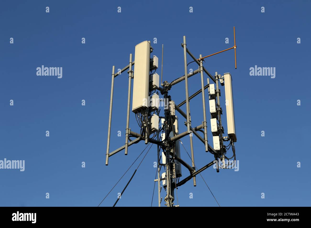 Antenna systems for telecommunication against the blue sky Stock Photo ...
