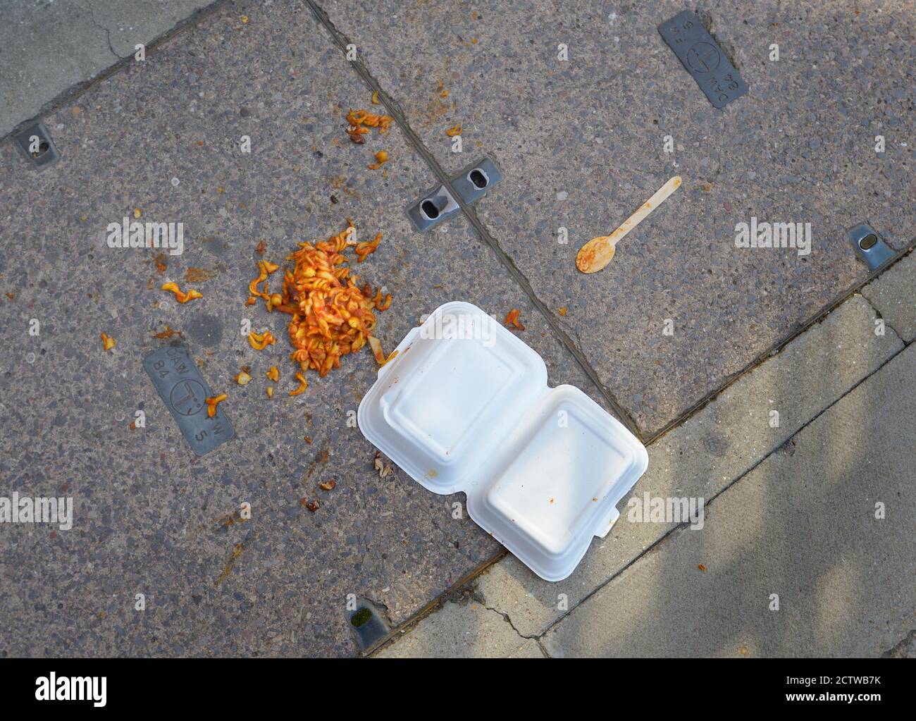 London, England, UK. Takeaway pasta meal fallen on the pavement Stock ...