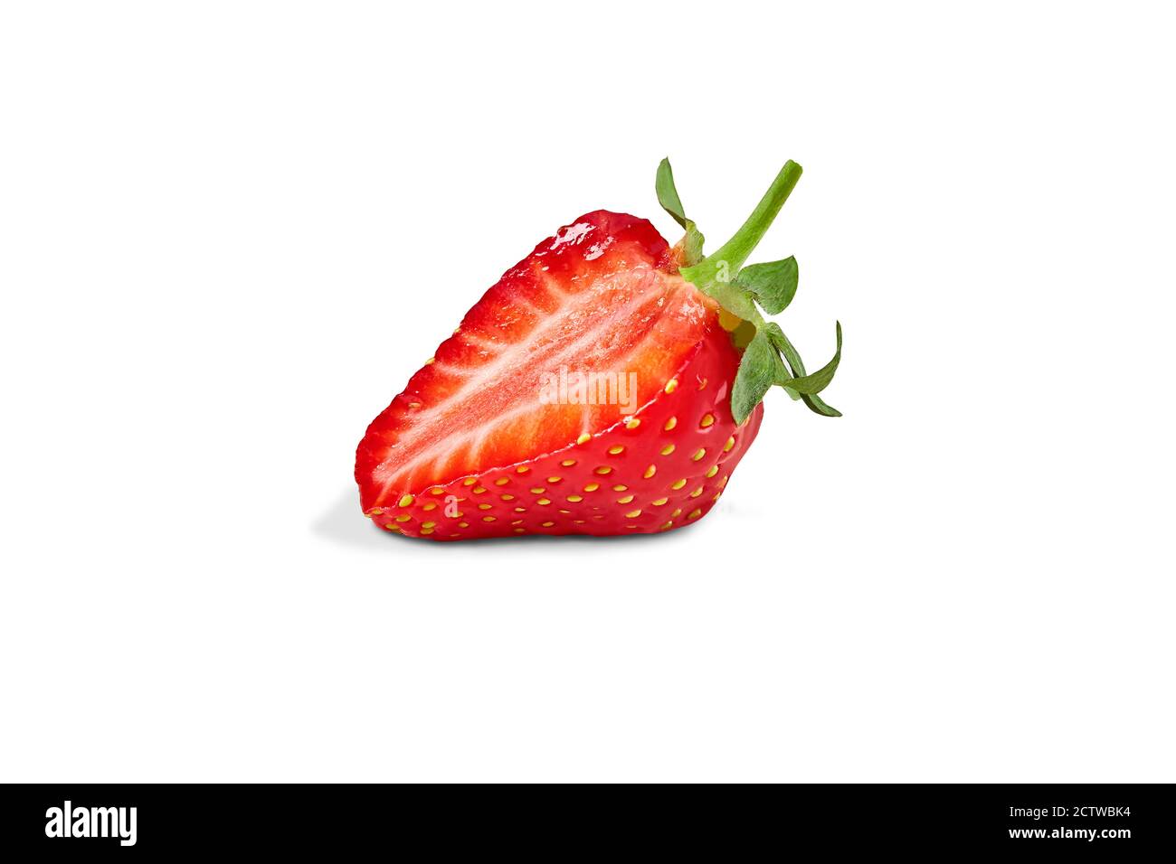 Half a strawberry isolated on white background. Summer harvest. Close ...