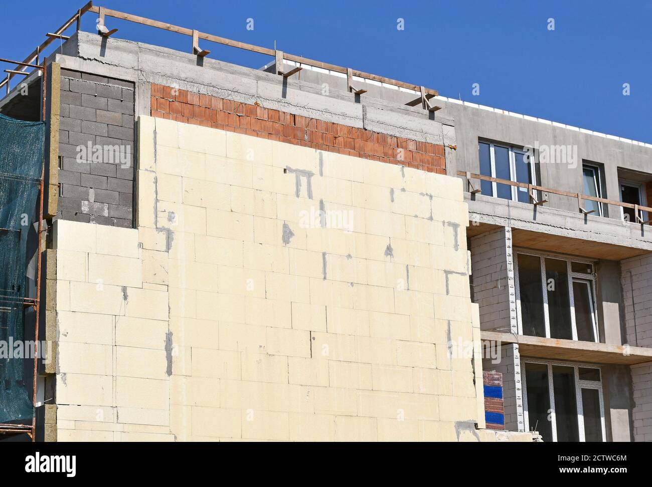 Insulation on the wall of a new apartment building Stock Photo - Alamy