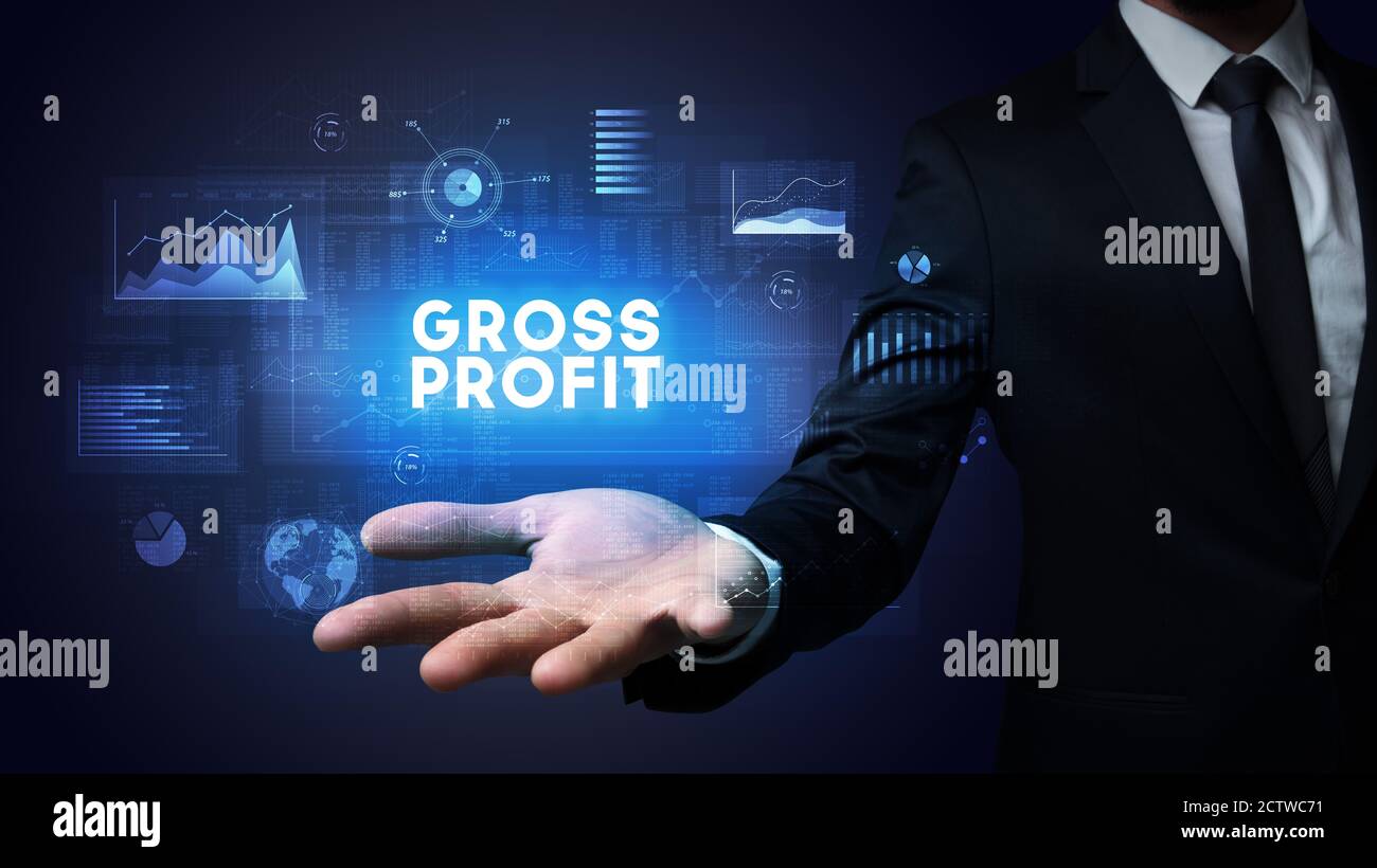 Hand of Businessman holding GROSS PROFIT inscription, business success ...
