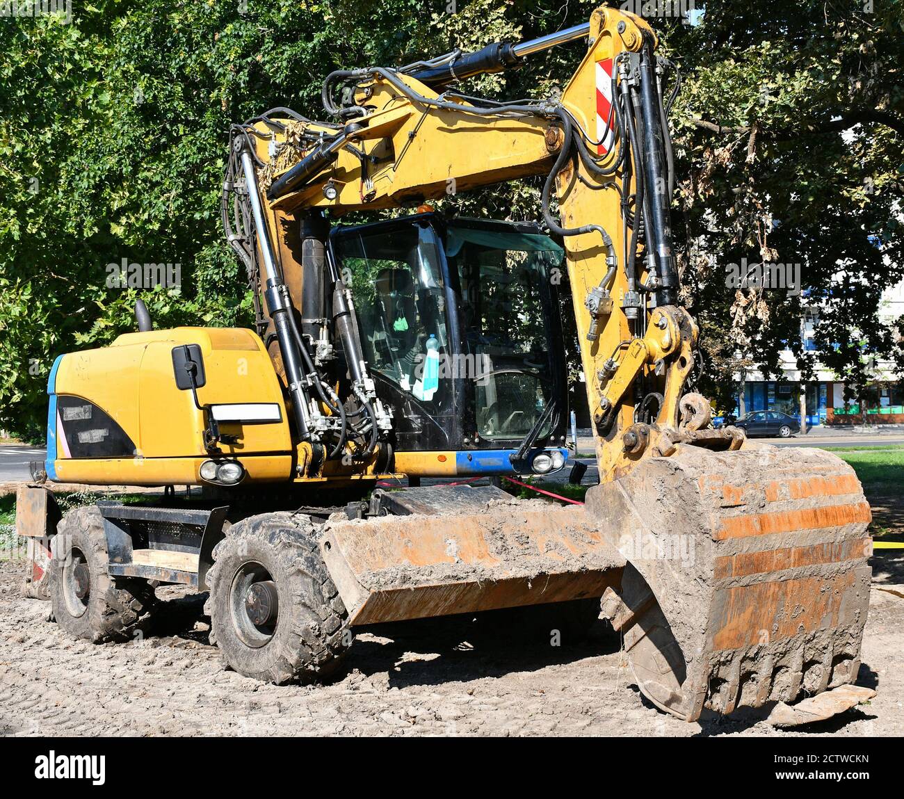 Excavator machinery at the road construction Stock Photo - Alamy