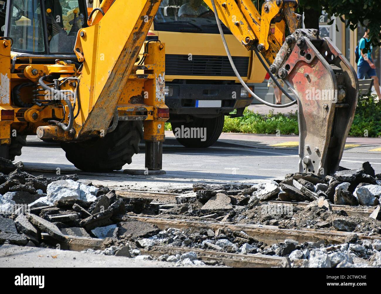 Breaking the asphalt on the road construction Stock Photo - Alamy
