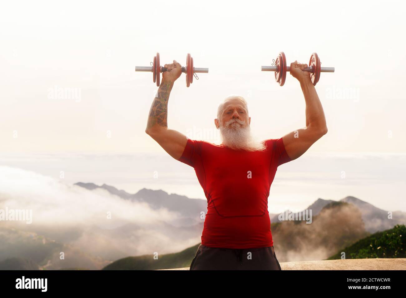 Senior man doing sport exercises Stock Photo - Alamy