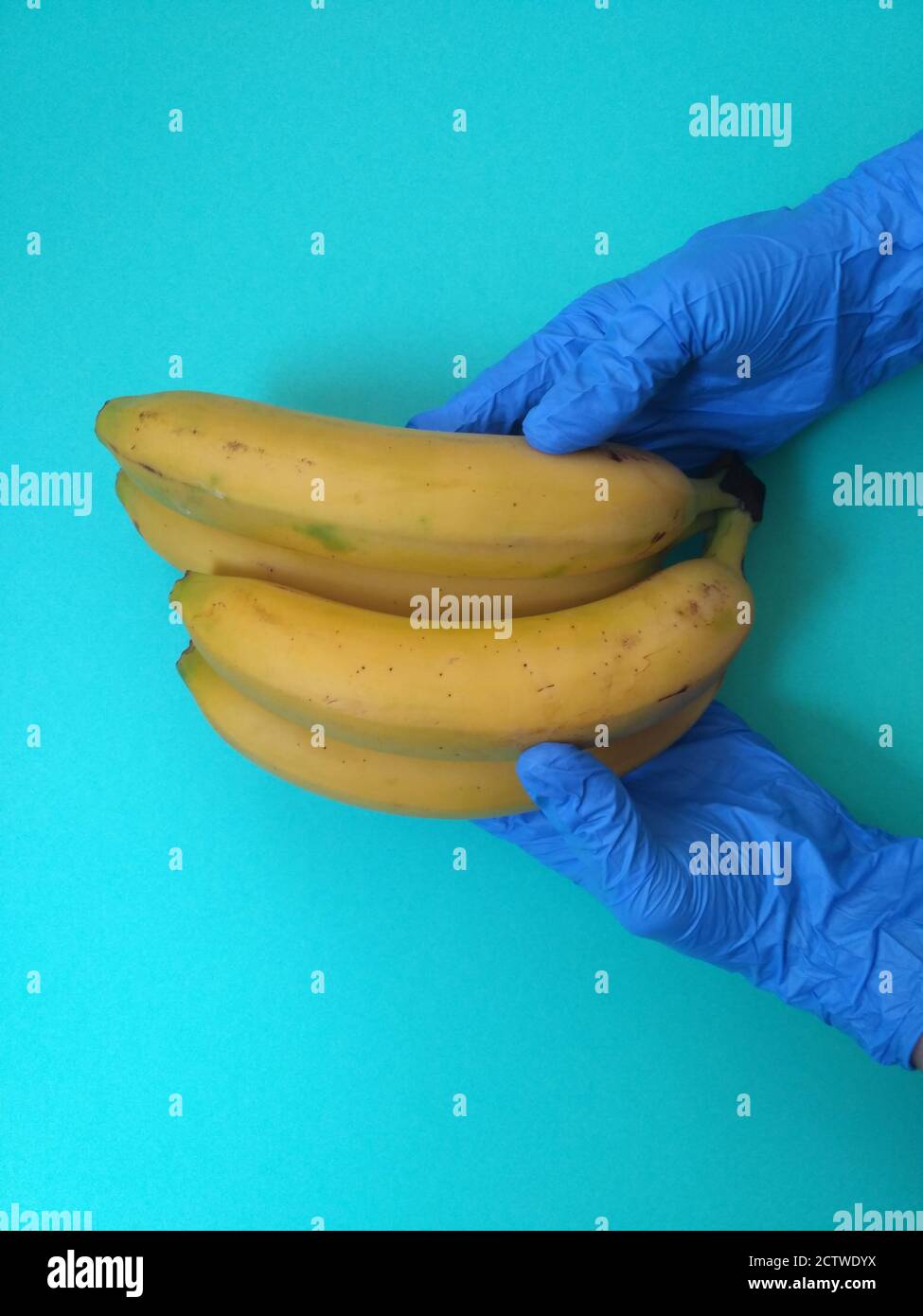Hands bananas hi-res stock photography and images - Alamy