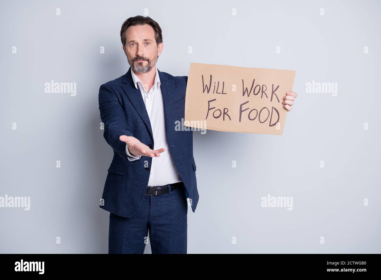 Homeless man asking for work hi-res stock photography and images - Alamy