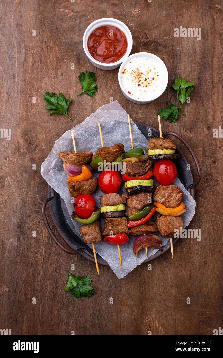 Grilled kebabs with meat, mushrooms and vegetables Stock Photo - Alamy