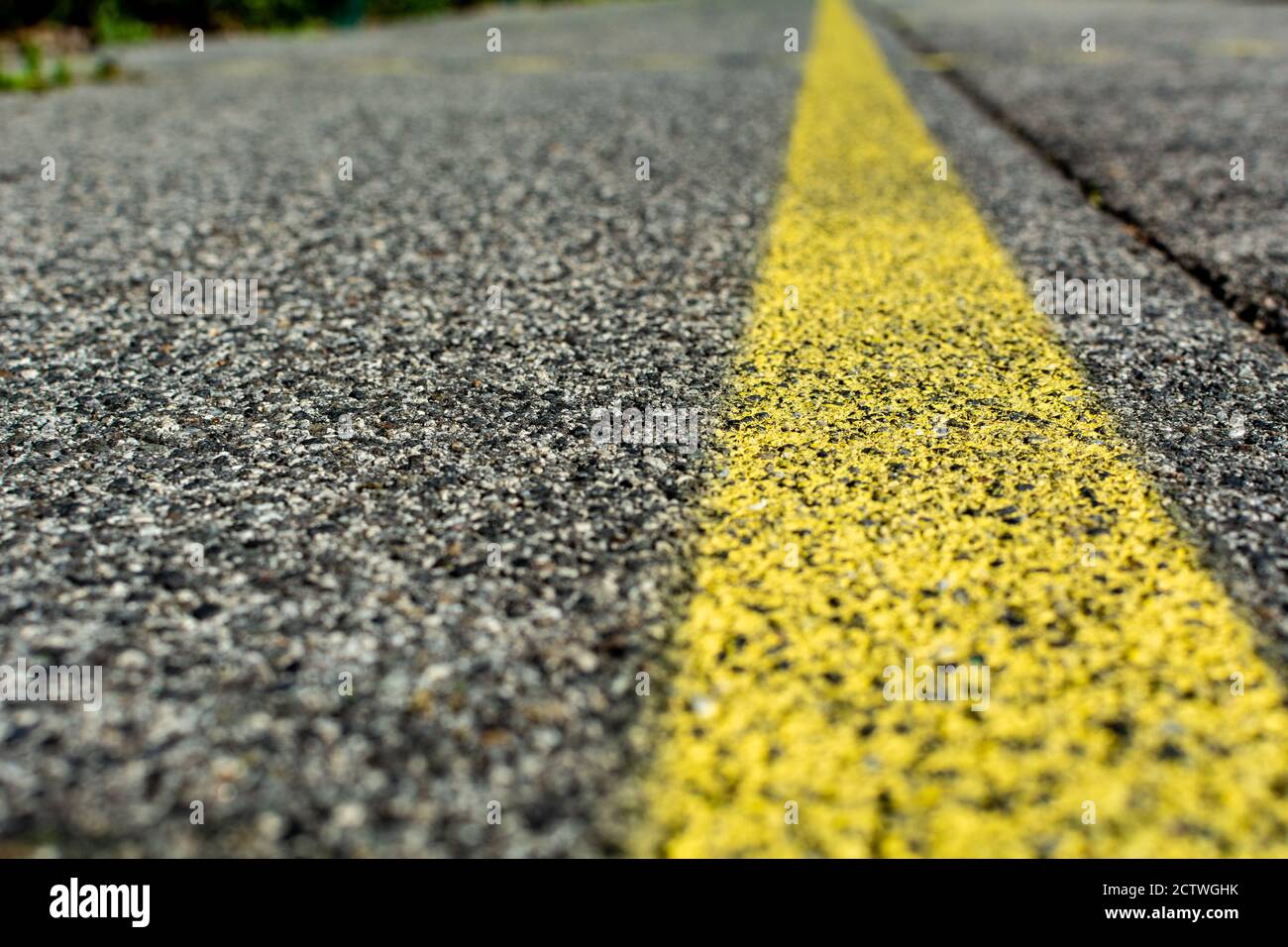 Structure of granular asphalt. Close up of an Asphalt texture with a ...
