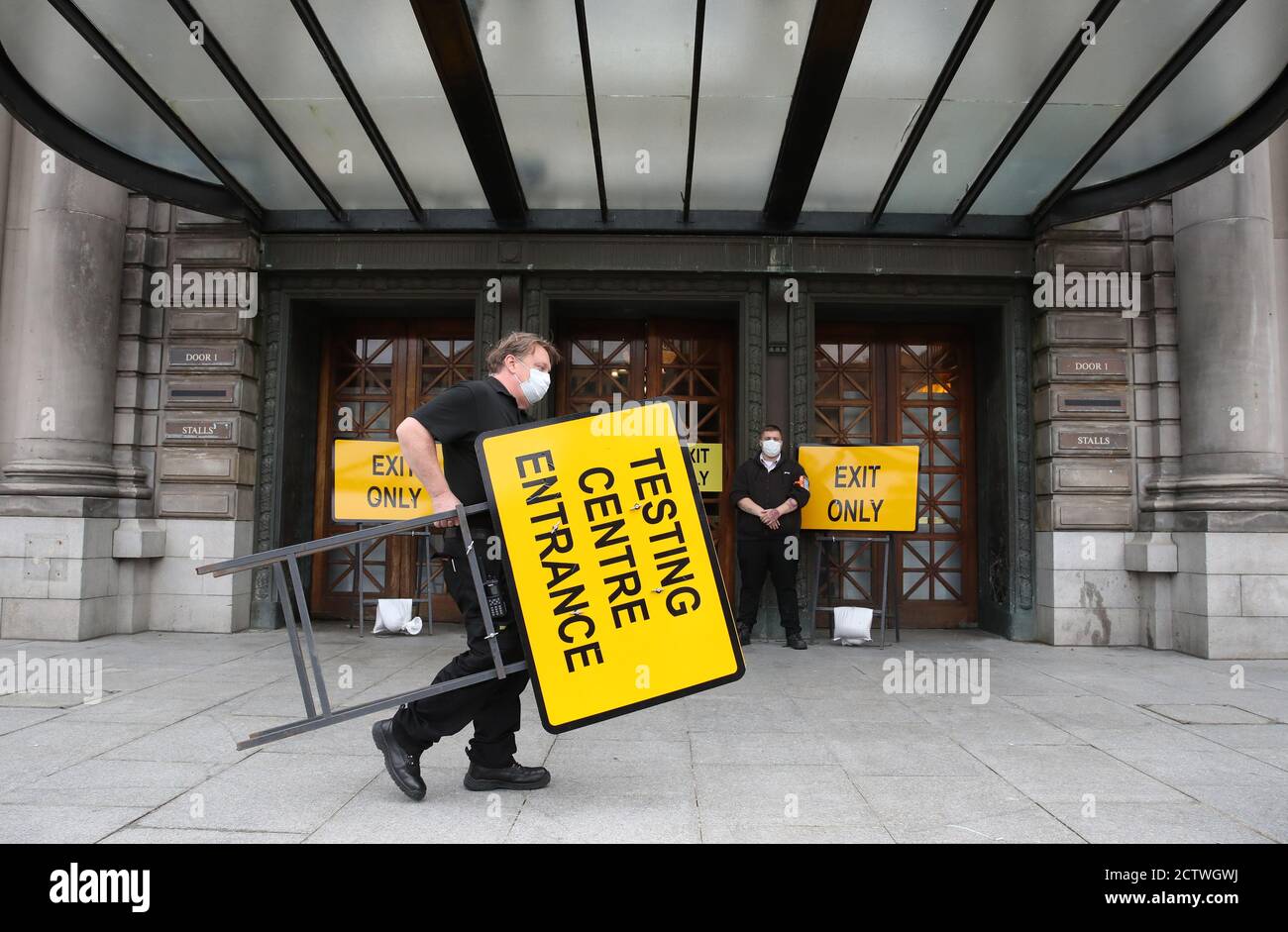 Signs are put in place at a new walk-through testing centre which will ...