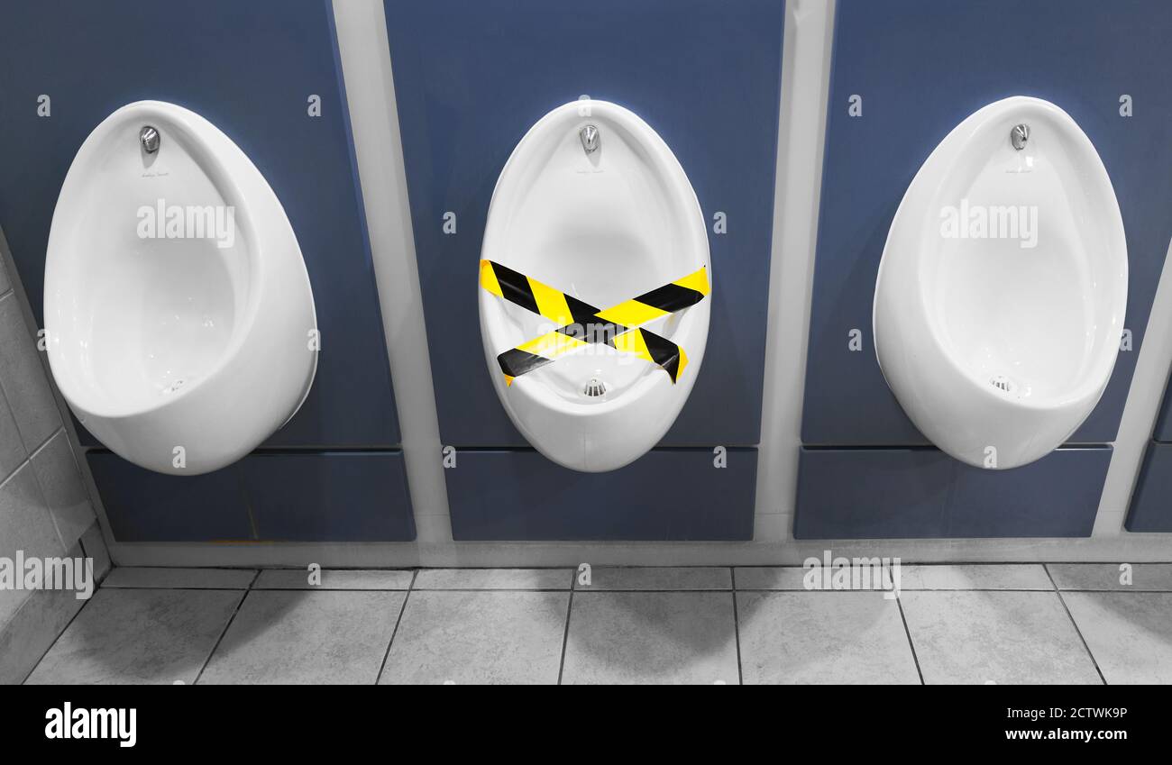 Taped off urinal hi-res stock photography and images - Alamy