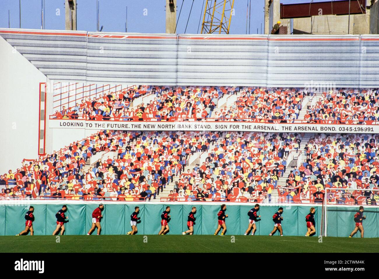 A massive mural covers the construction work on the new North Bank ...