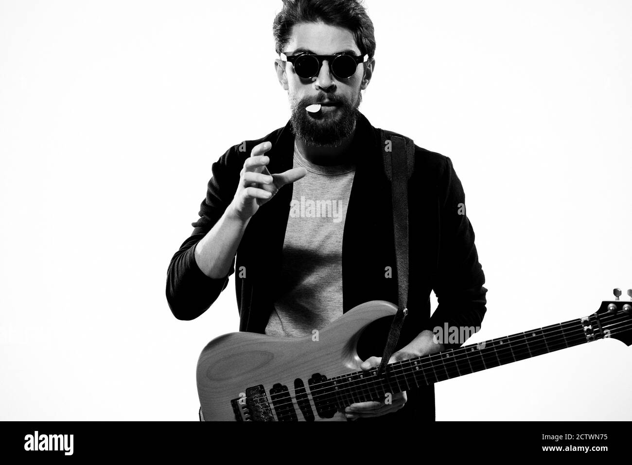 man with guitar in hands musician rock star performance lifestyle light ...