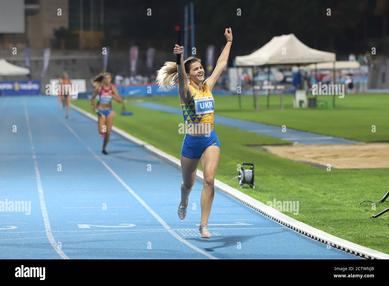 ISTANBUL, TURKEY - SEPTEMBER 13, 2020: Athletes running 4x400 metres ...