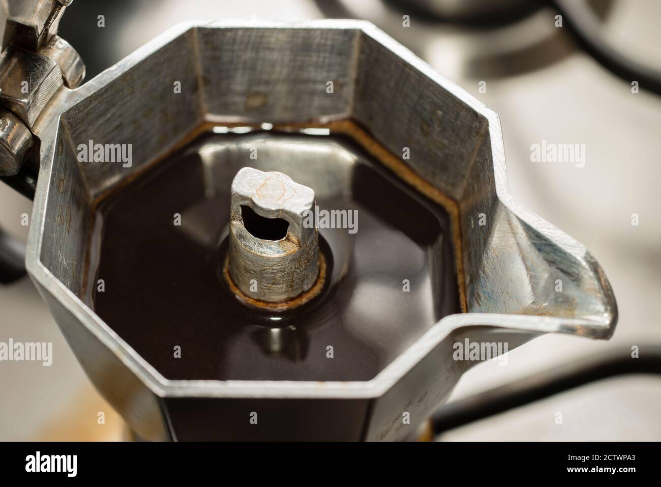 Traditional italian moka machine with fresh hot coffee coming up Stock ...