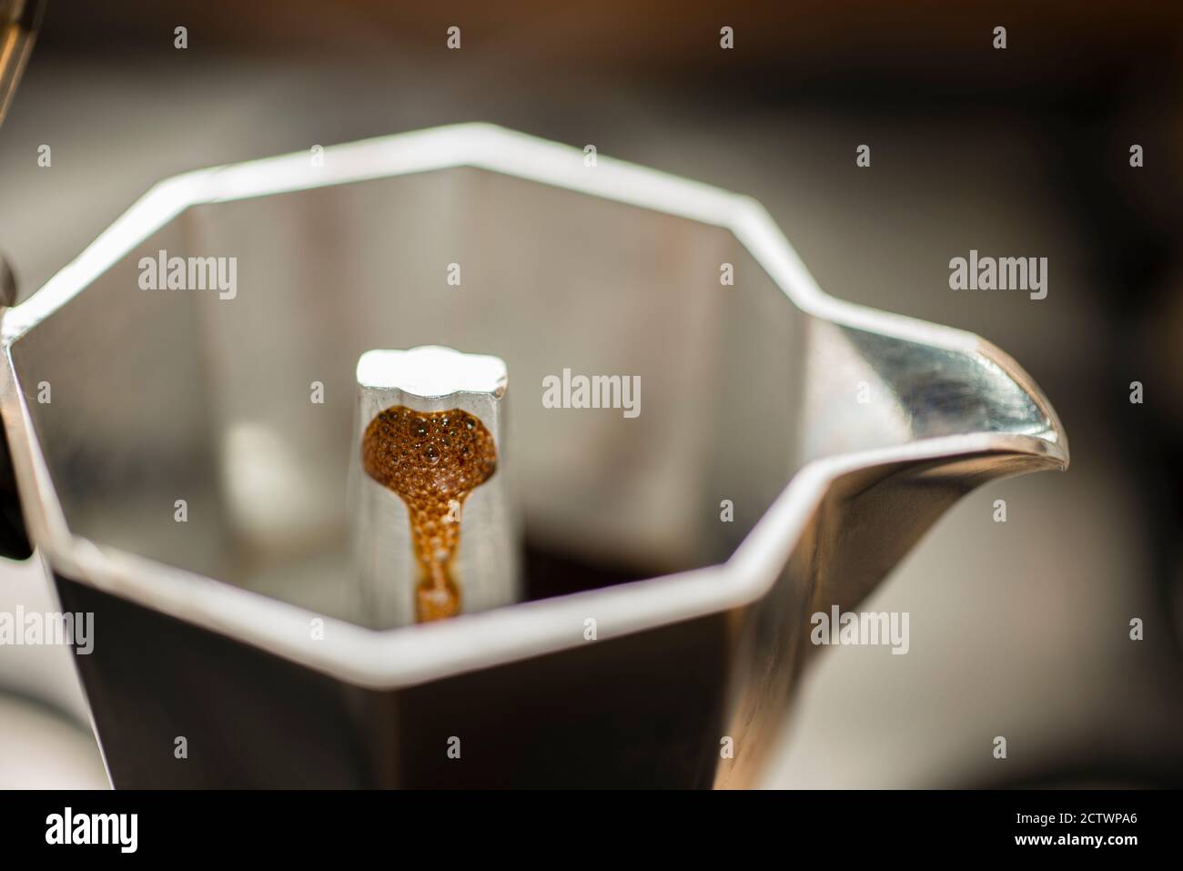 Traditional italian moka machine with fresh hot coffee coming up Stock ...