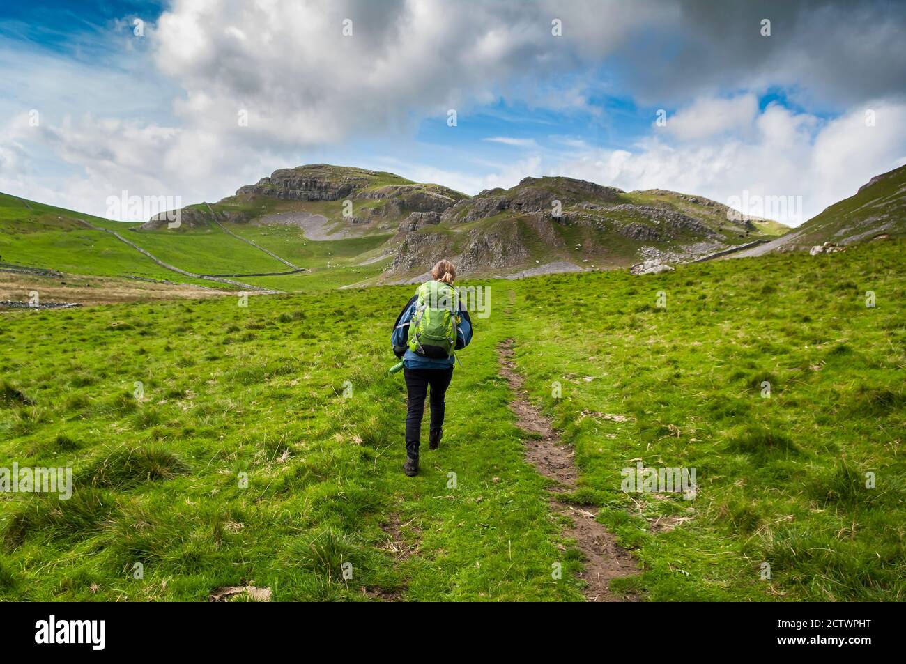 Dominika Wroblewska walking at the west end of Langcliffe Scar near ...