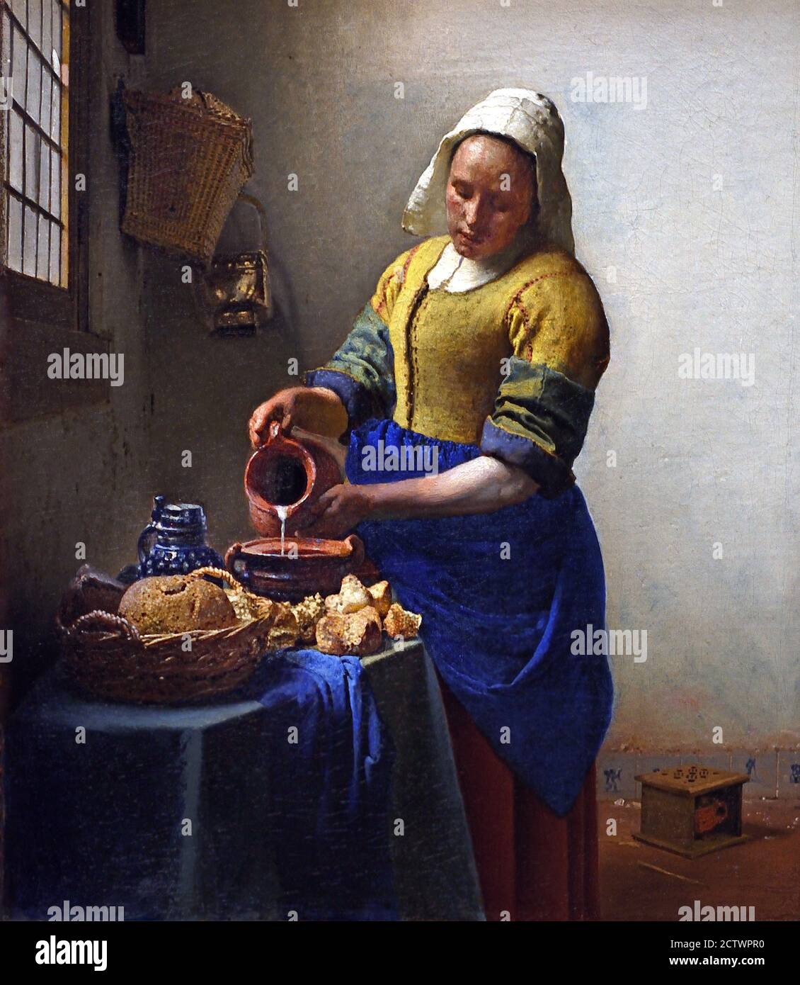 Johannes Vermeer or Jan Vermeer 1632 - 1675 The Kitchen Maid Milkmaid - Het melkmeisje (1658 ...