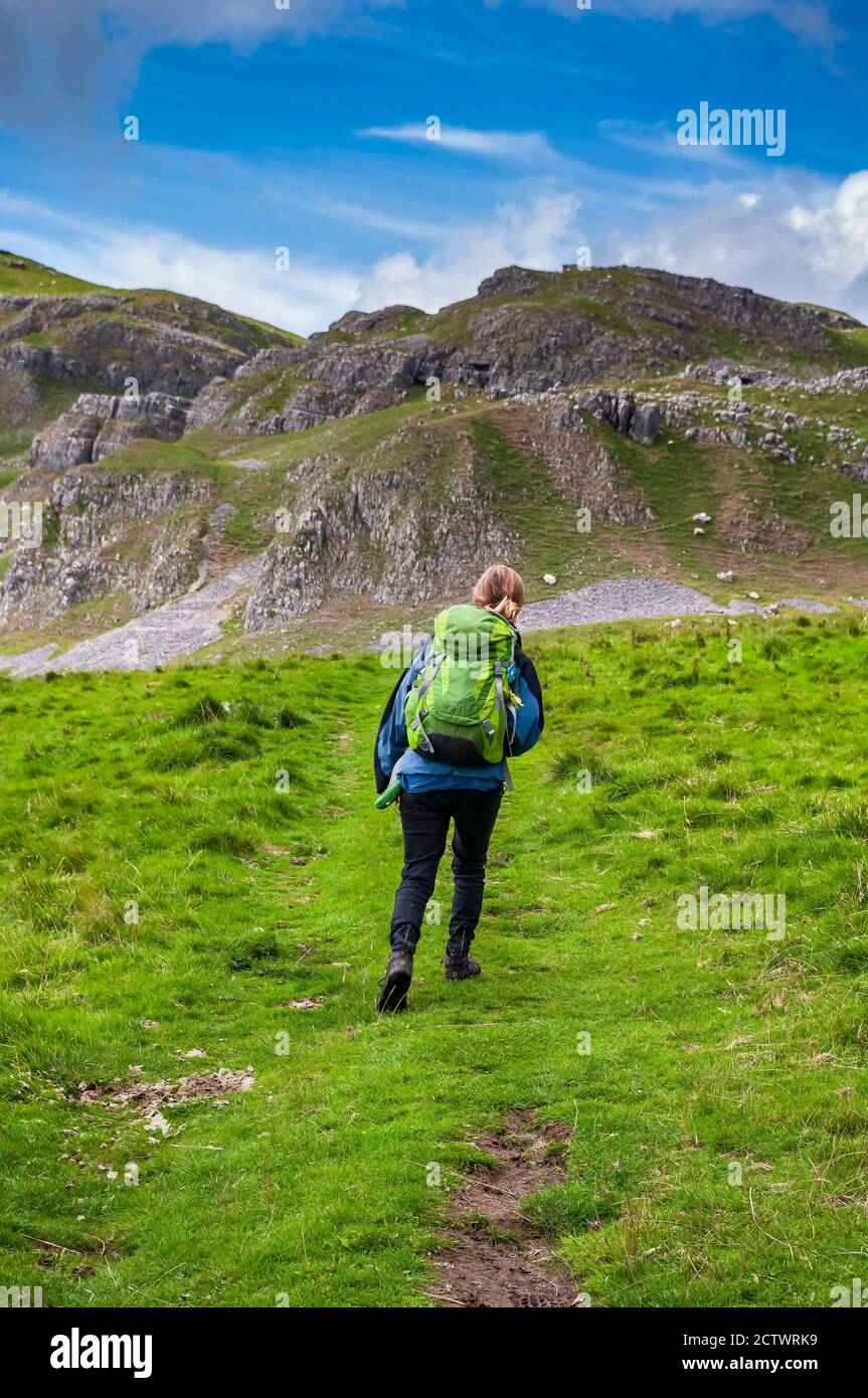 Dominika Wroblewska walking at the west end of Langcliffe Scar near ...