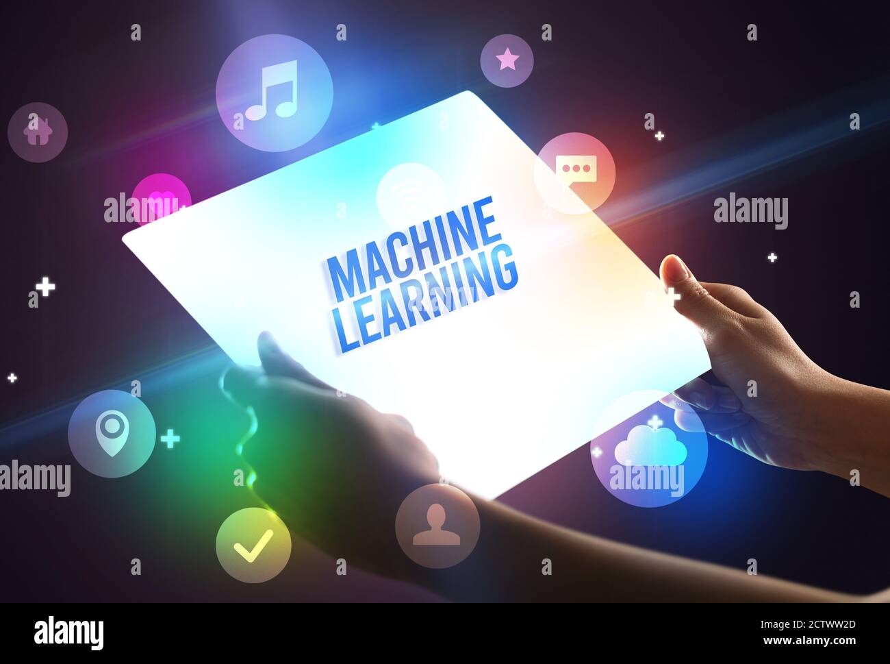 Holding futuristic tablet with MACHINE LEARNING inscription, new ...