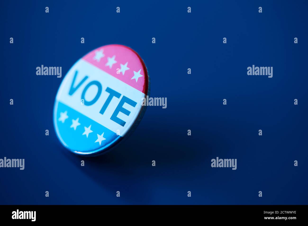 closeup of a vote badge for the United States election on a dark blue ...